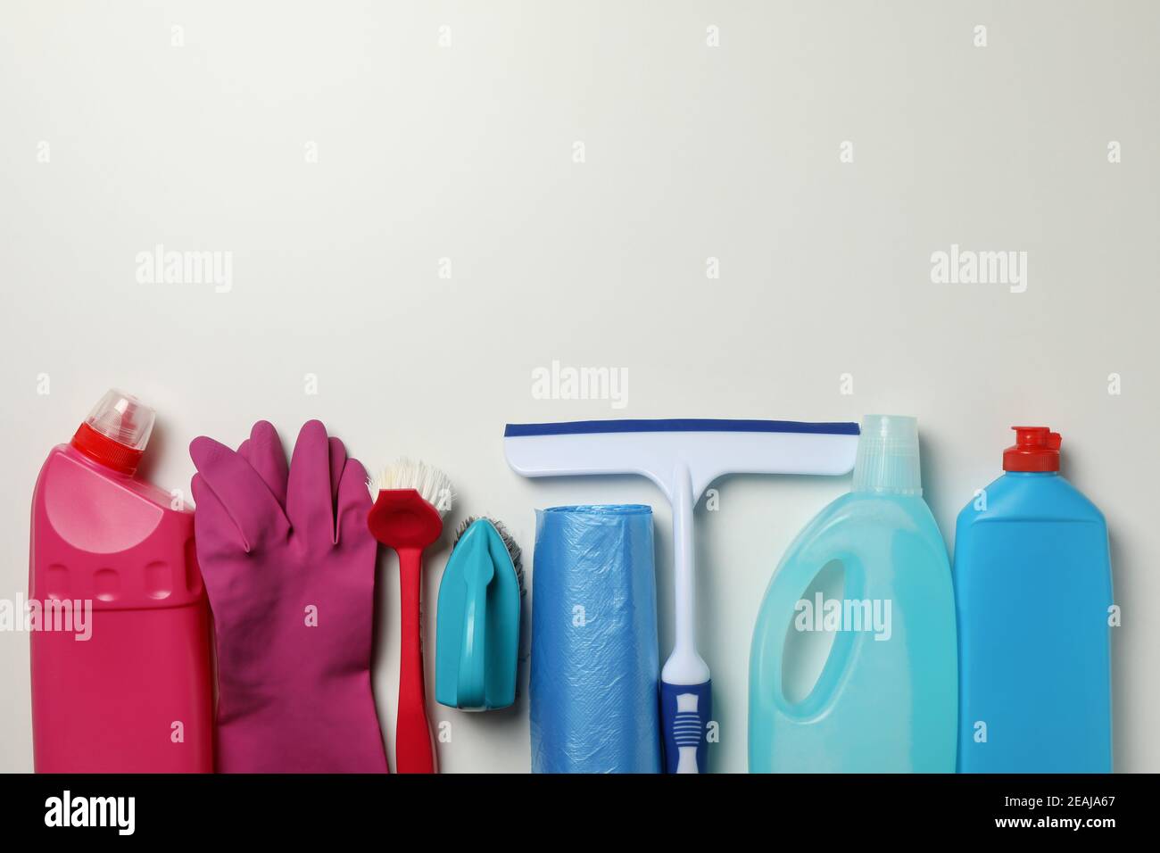Different cleaning tools on white background, space for text Stock ...