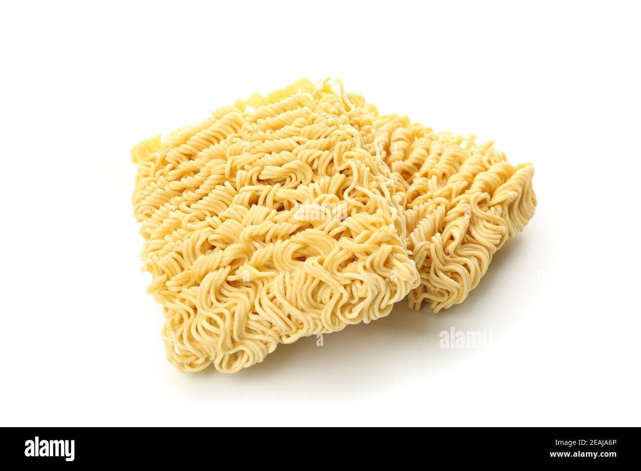 Two pieces instant noodles on white background Stock Photo - Alamy