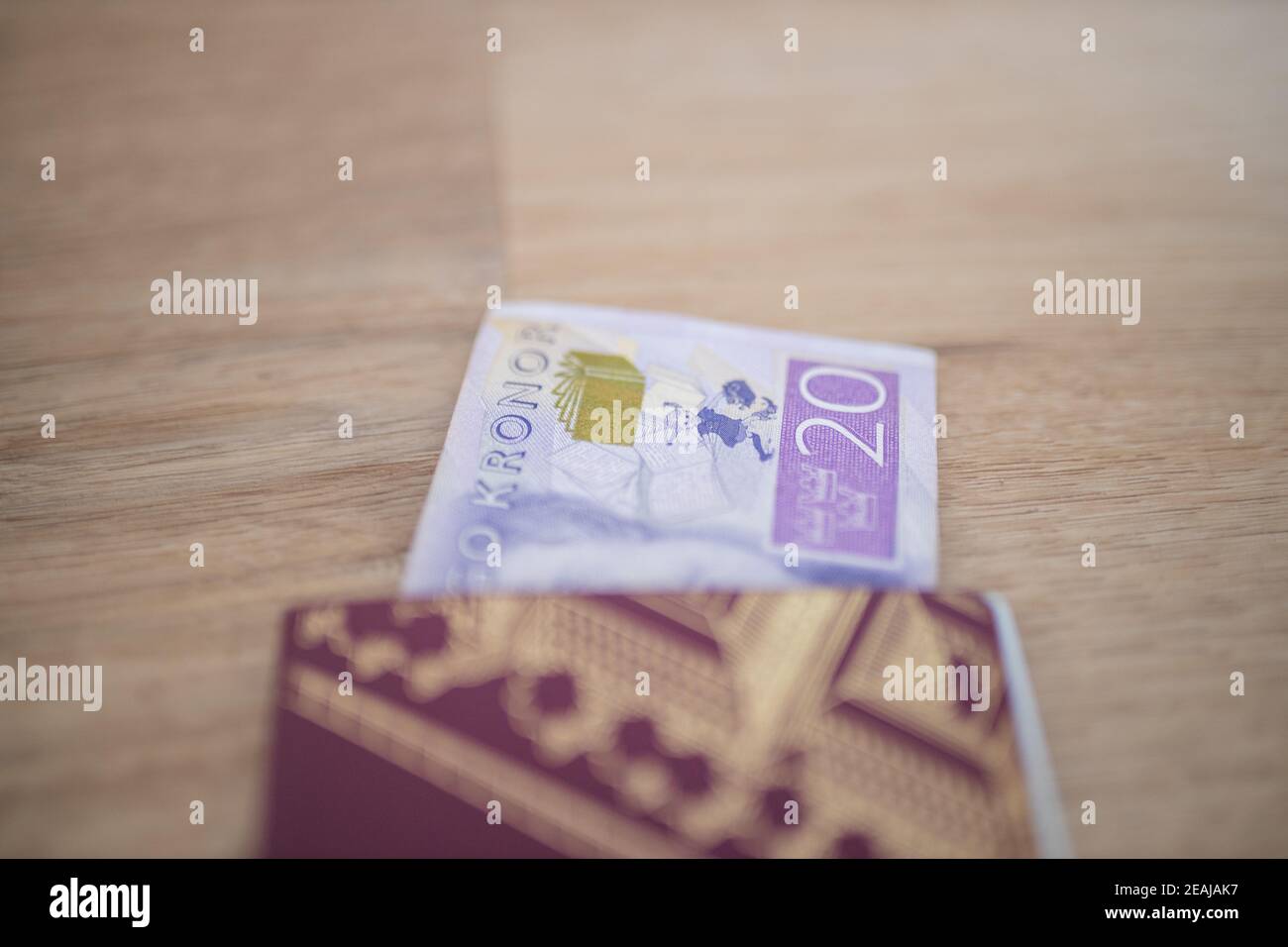 20 Swedish Kronor Banknote Partially Inside a Sweden Passport Stock ...