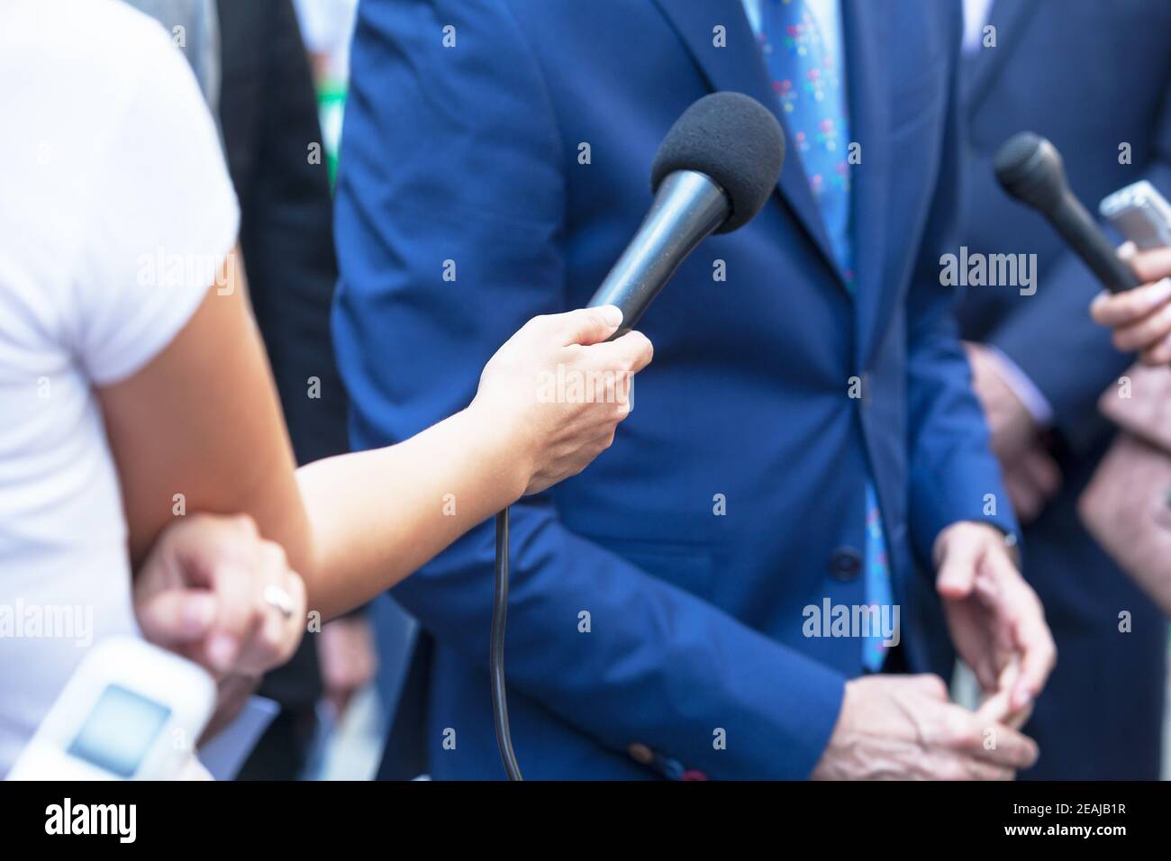 Reporters making media interview with businessman or politician Stock ...