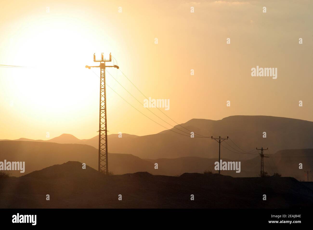 Power lines and array of electric pylons in Judea desert, Israel Stock ...