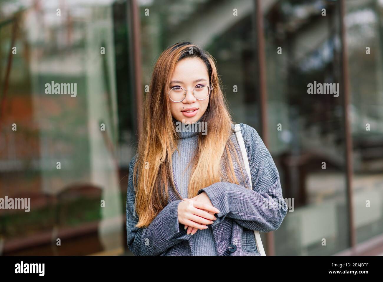 Young Asian woman, sad face portrait in city at the evening Stock Photo ...
