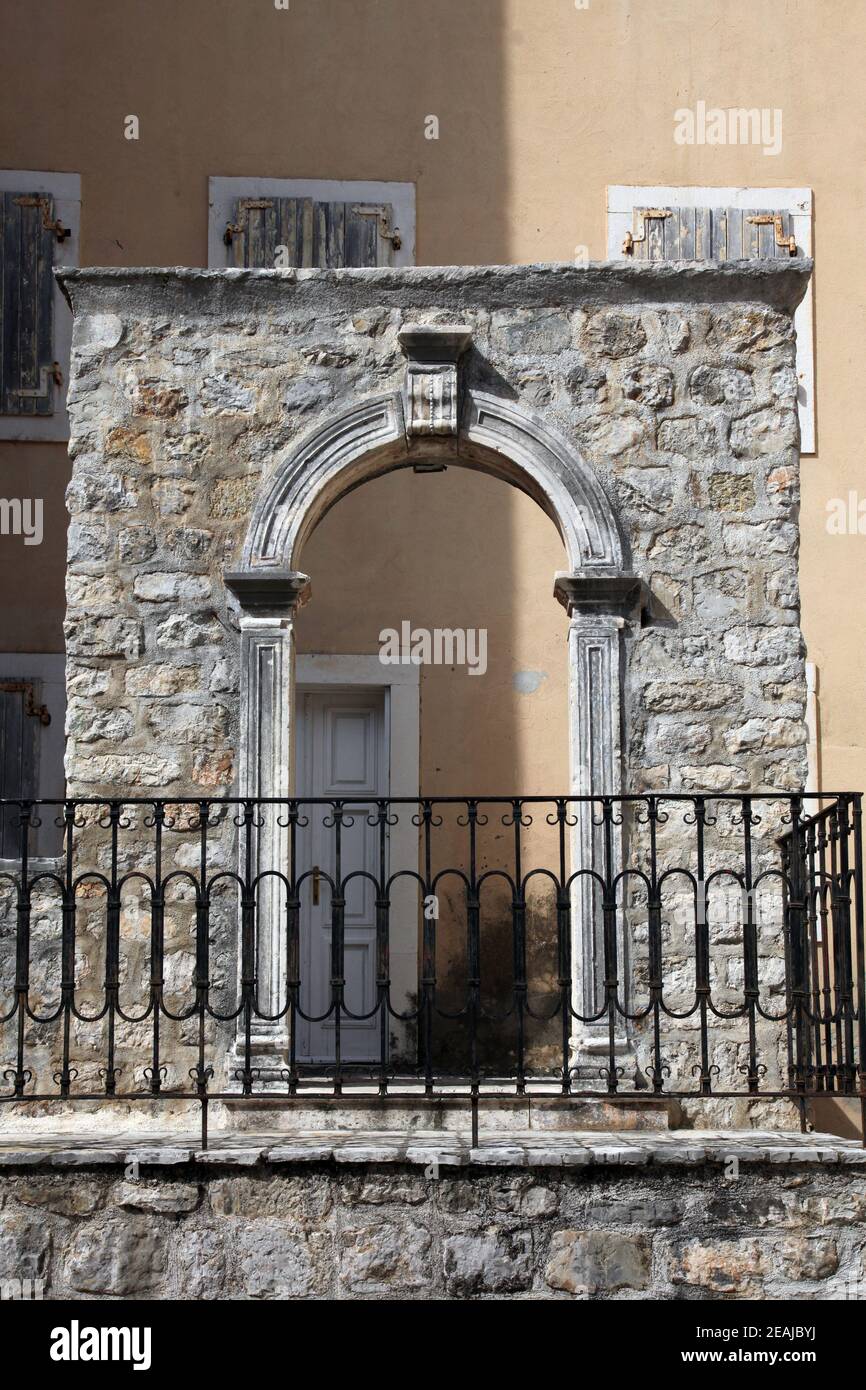 Old house, windows with shutters and stone arc in Budva, Montenegro ...