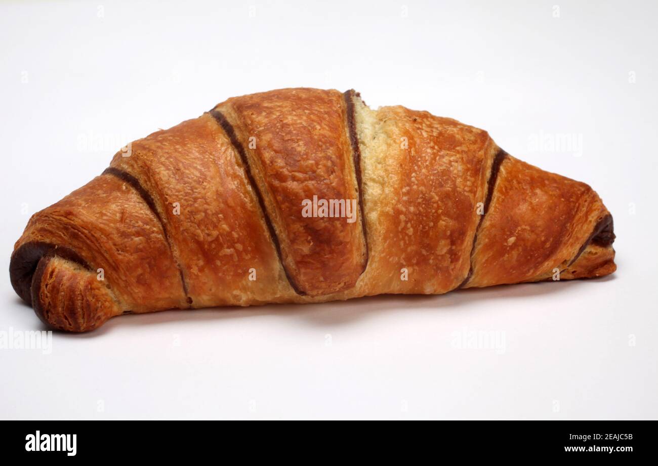 Chocolate croissant isolated on a white background Stock Photo - Alamy