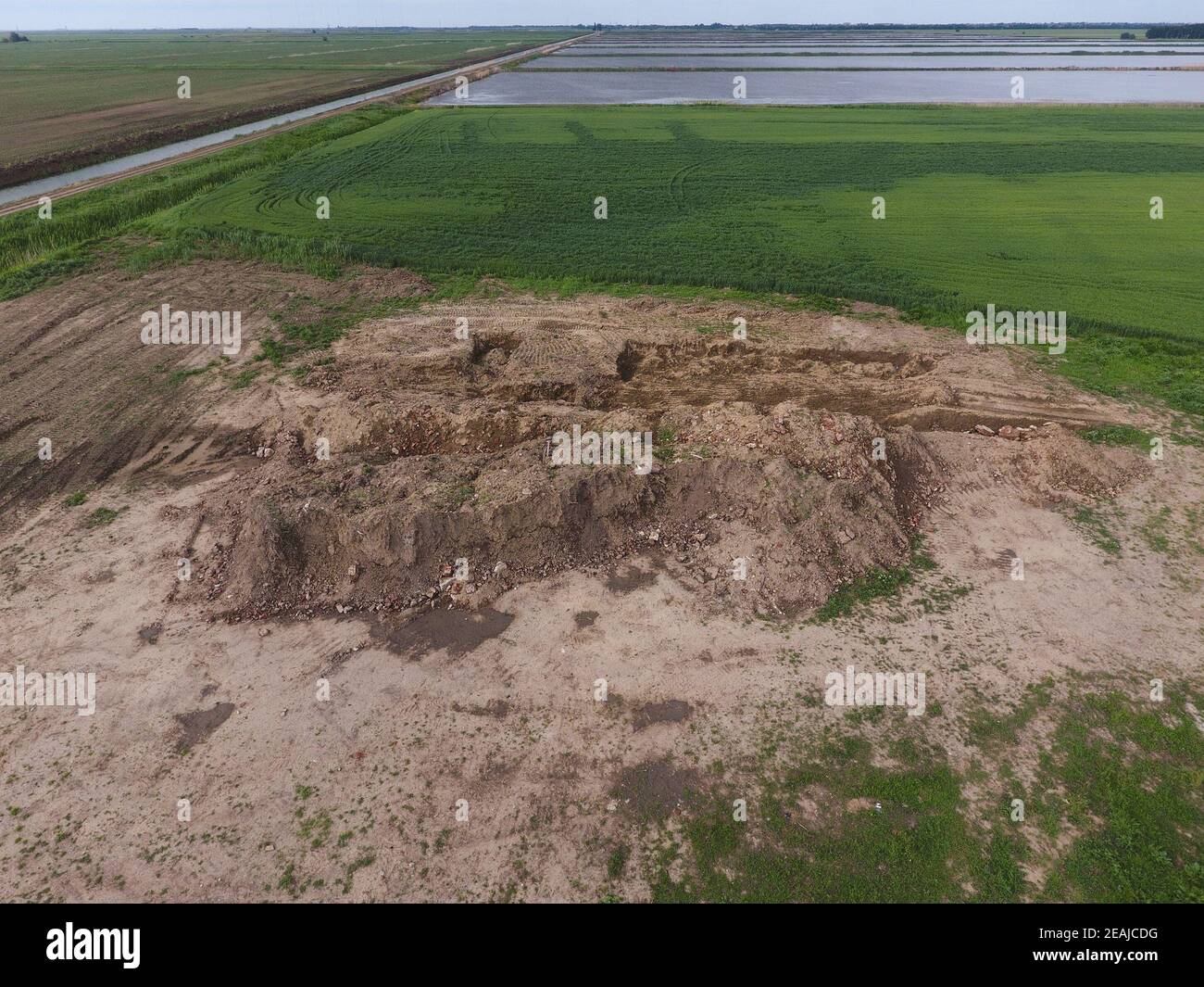 Pile of soil and rock, pours tippers Stock Photo - Alamy