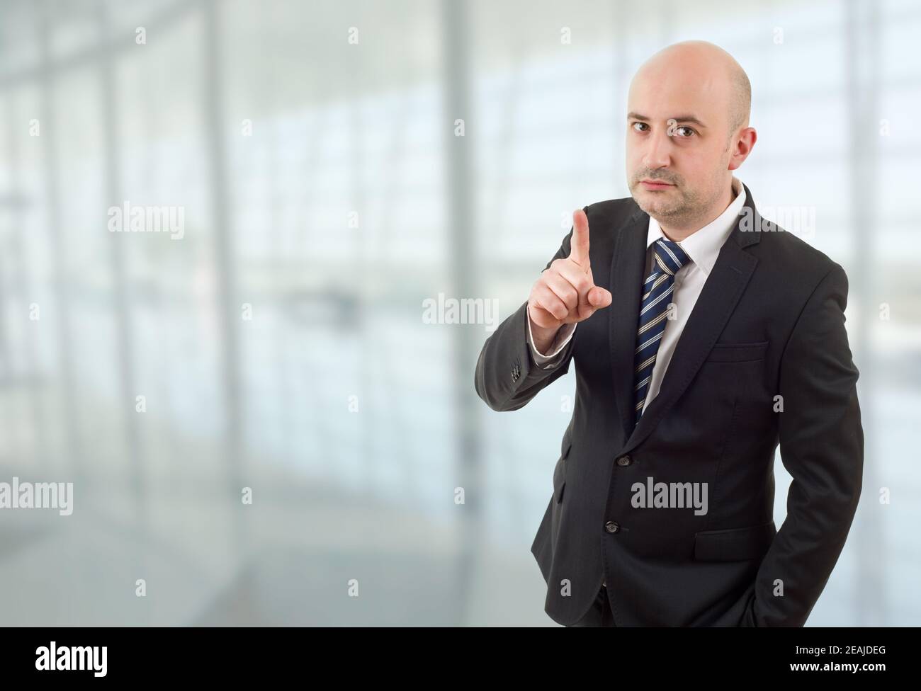 mad business man pointing Stock Photo - Alamy