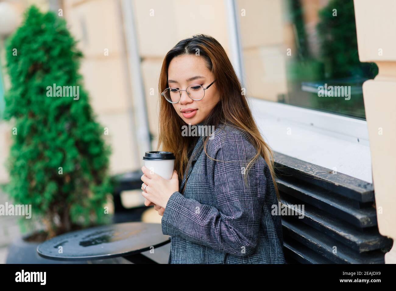 Young Asian woman, sad face portrait in city at the evening Stock Photo ...