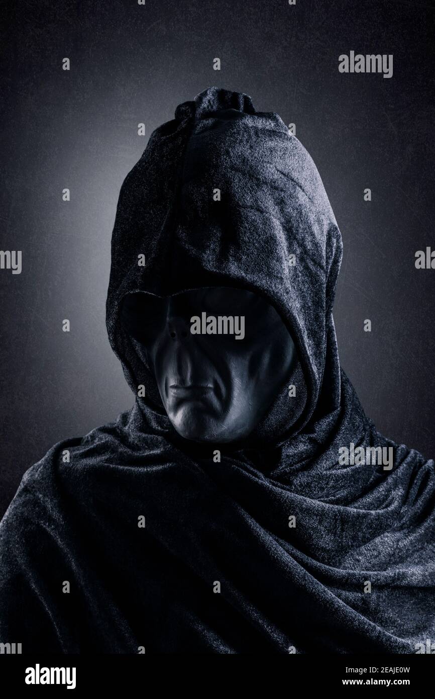 Portrait of a scary humanoid alien in the dark Stock Photo - Alamy