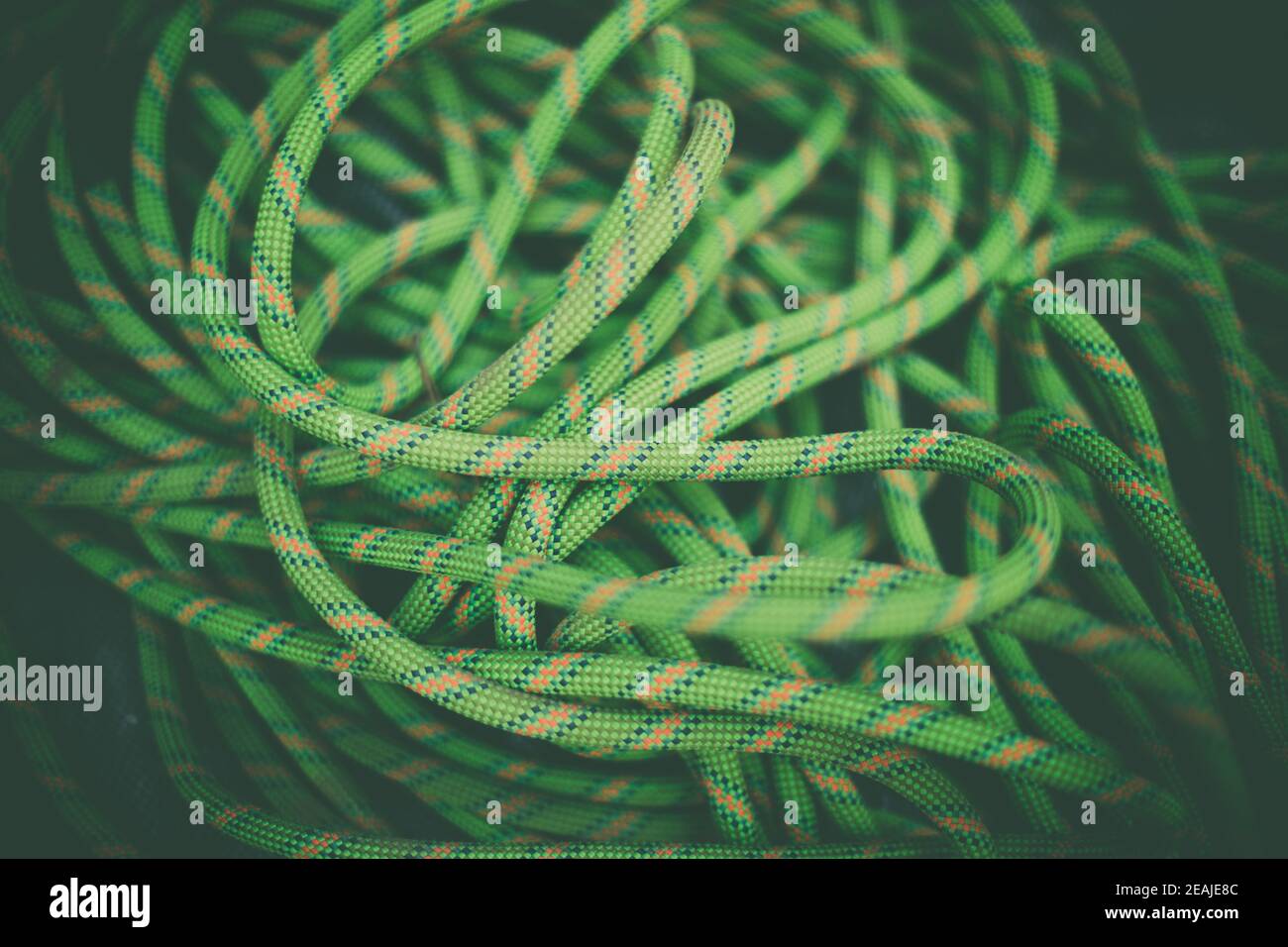 Pile of green rock climbing rope Stock Photo - Alamy
