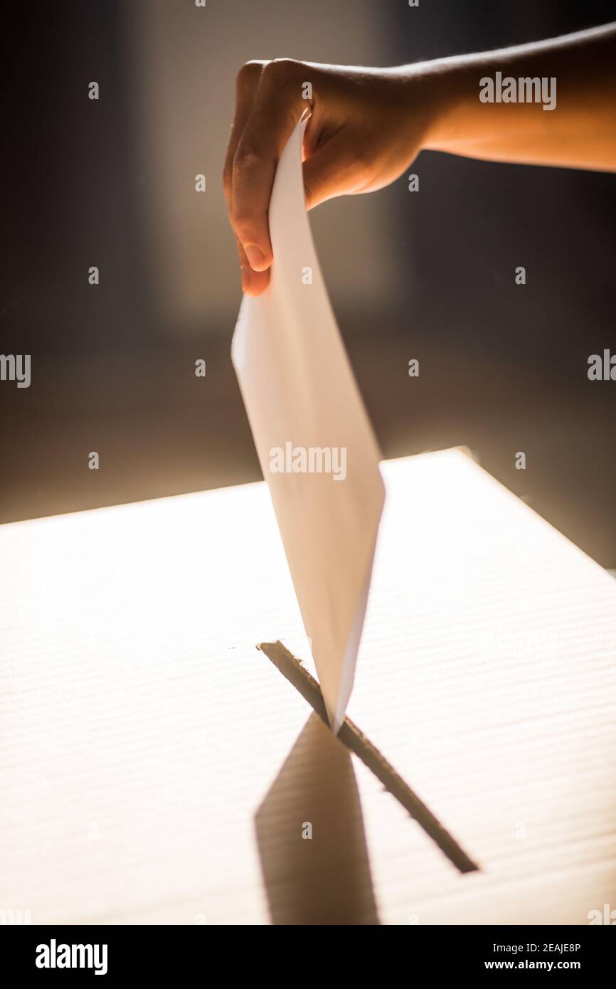 Conceptual image of a person voting during elections Stock Photo - Alamy