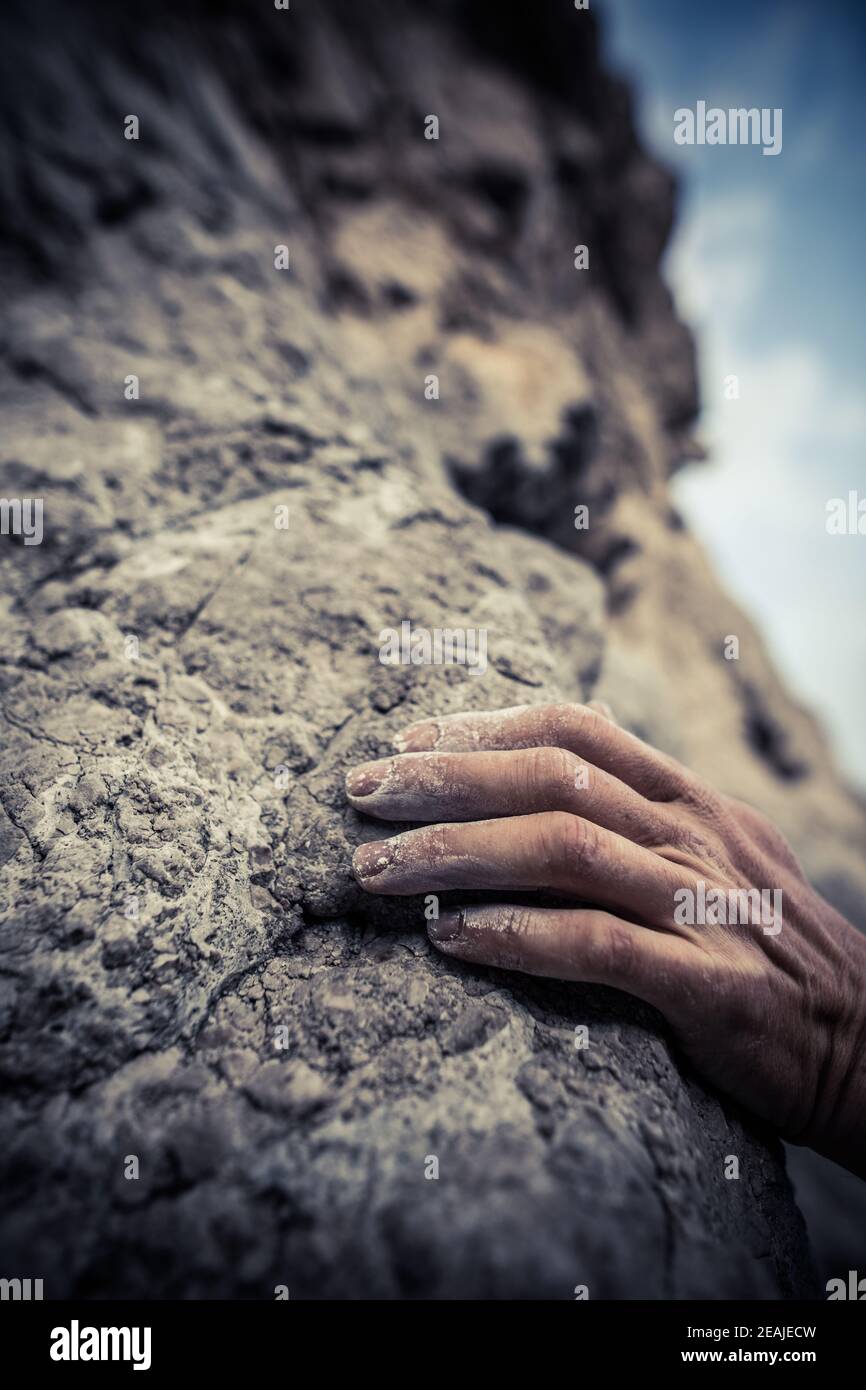 Hand holding chalk stone hi-res stock photography and images - Alamy