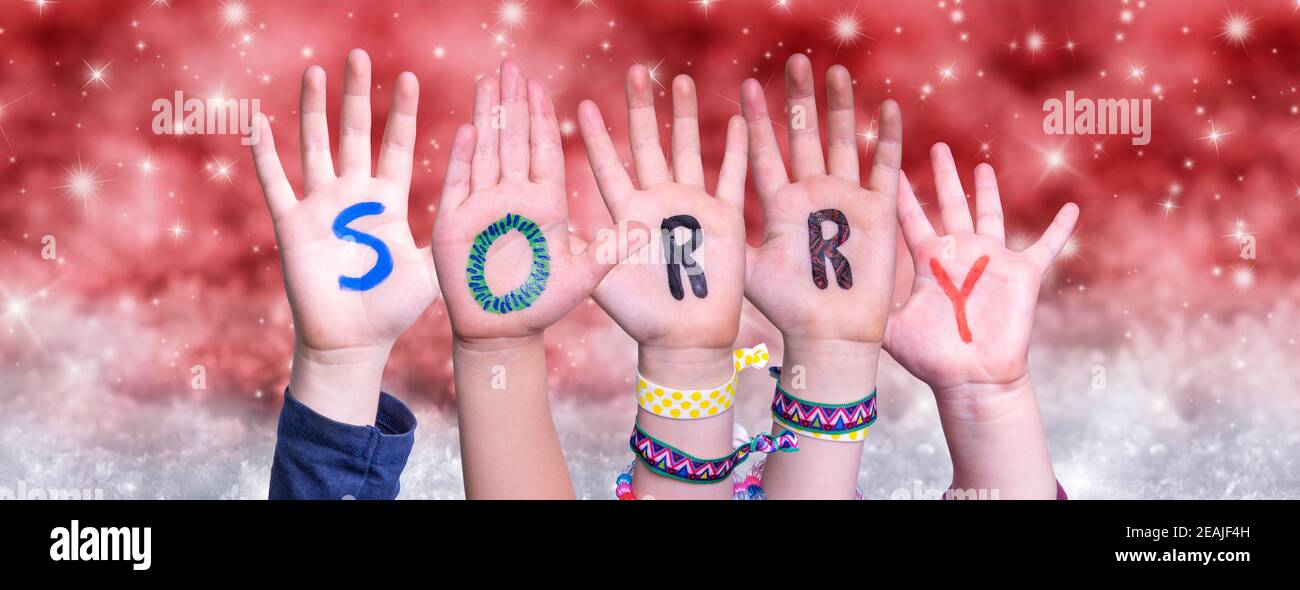 Children Hands Building Word Sorry, Red Christmas Background Stock ...