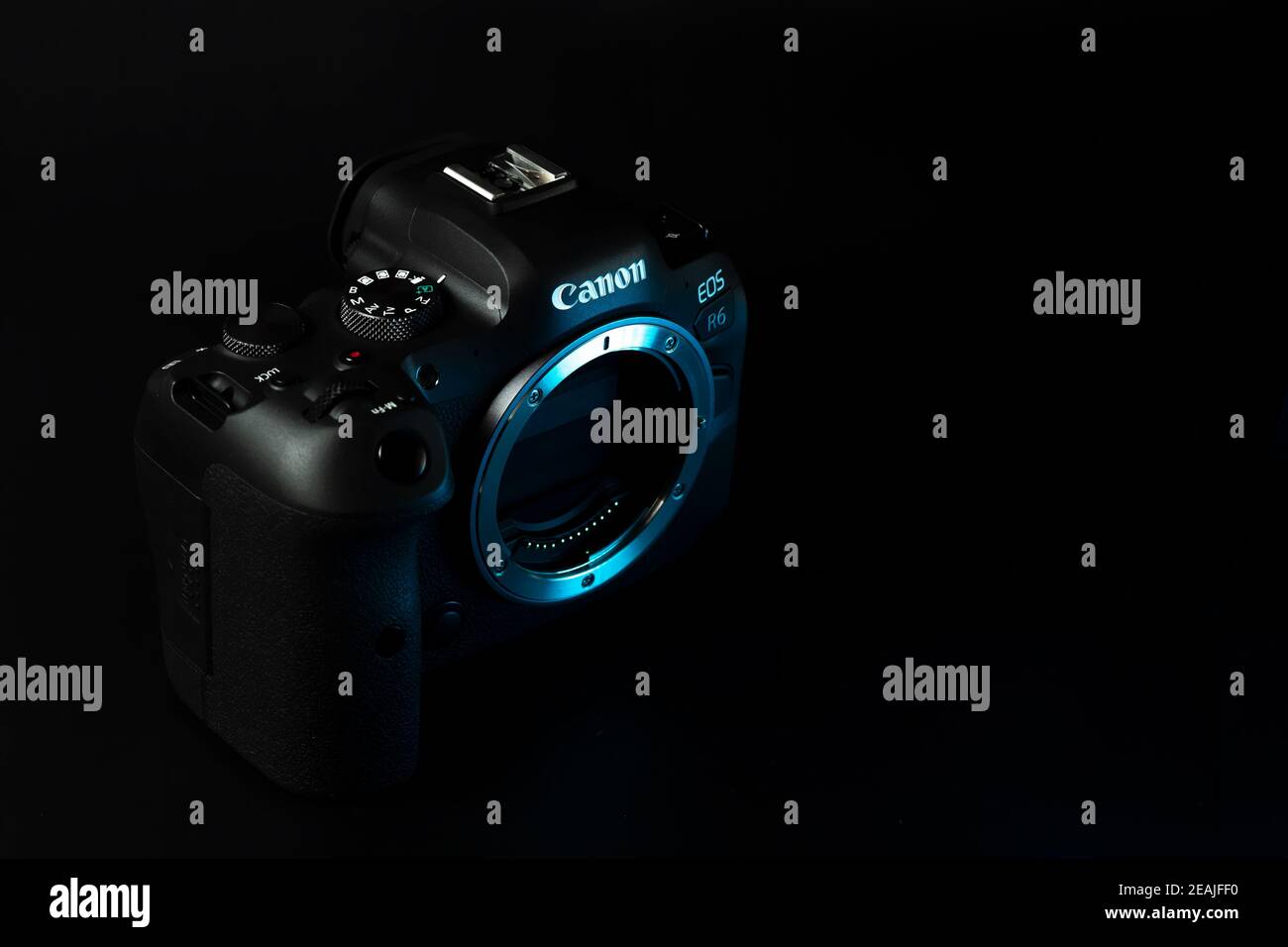 Canon r6 digital camera close-up, black background, glare Stock Photo ...