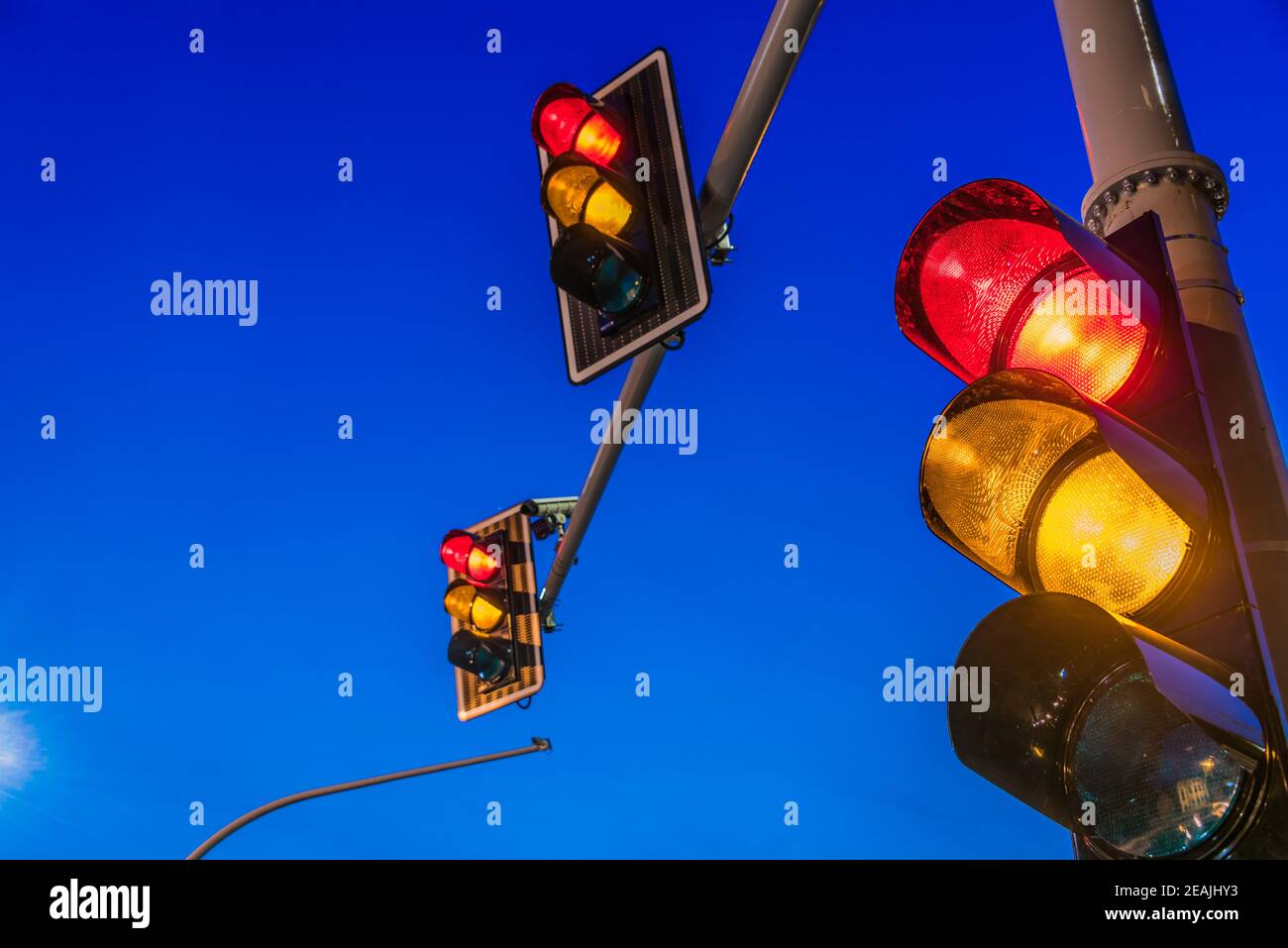 Traffic lights over urban intersection Stock Photo - Alamy