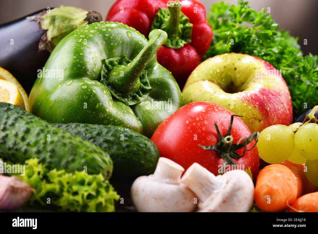 Composition with fresh organic vegetables and fruits Stock Photo - Alamy