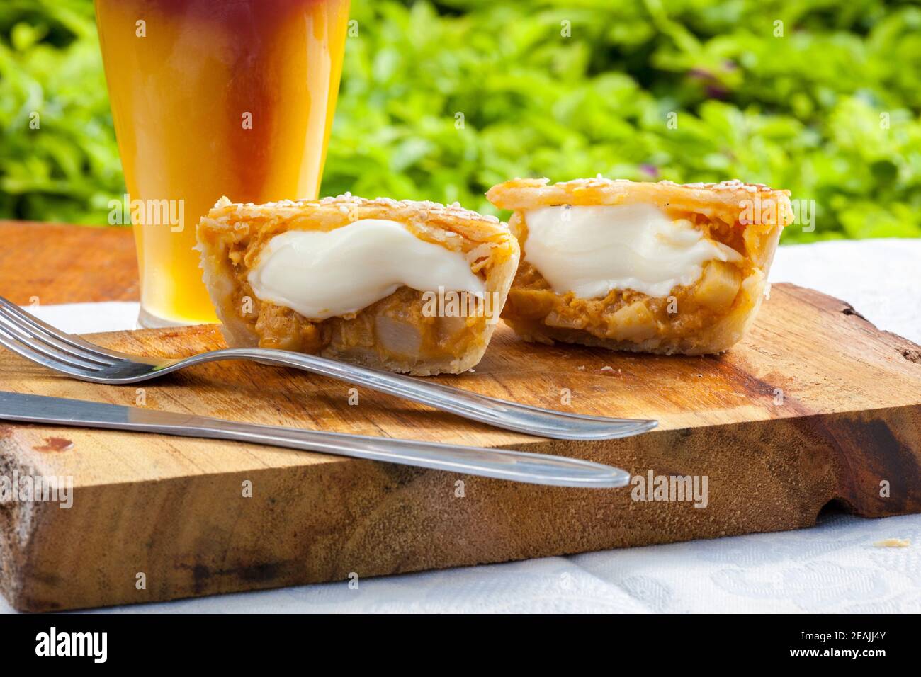 Empada, traditional Brazilian snack with catupiry Stock Photo - Alamy