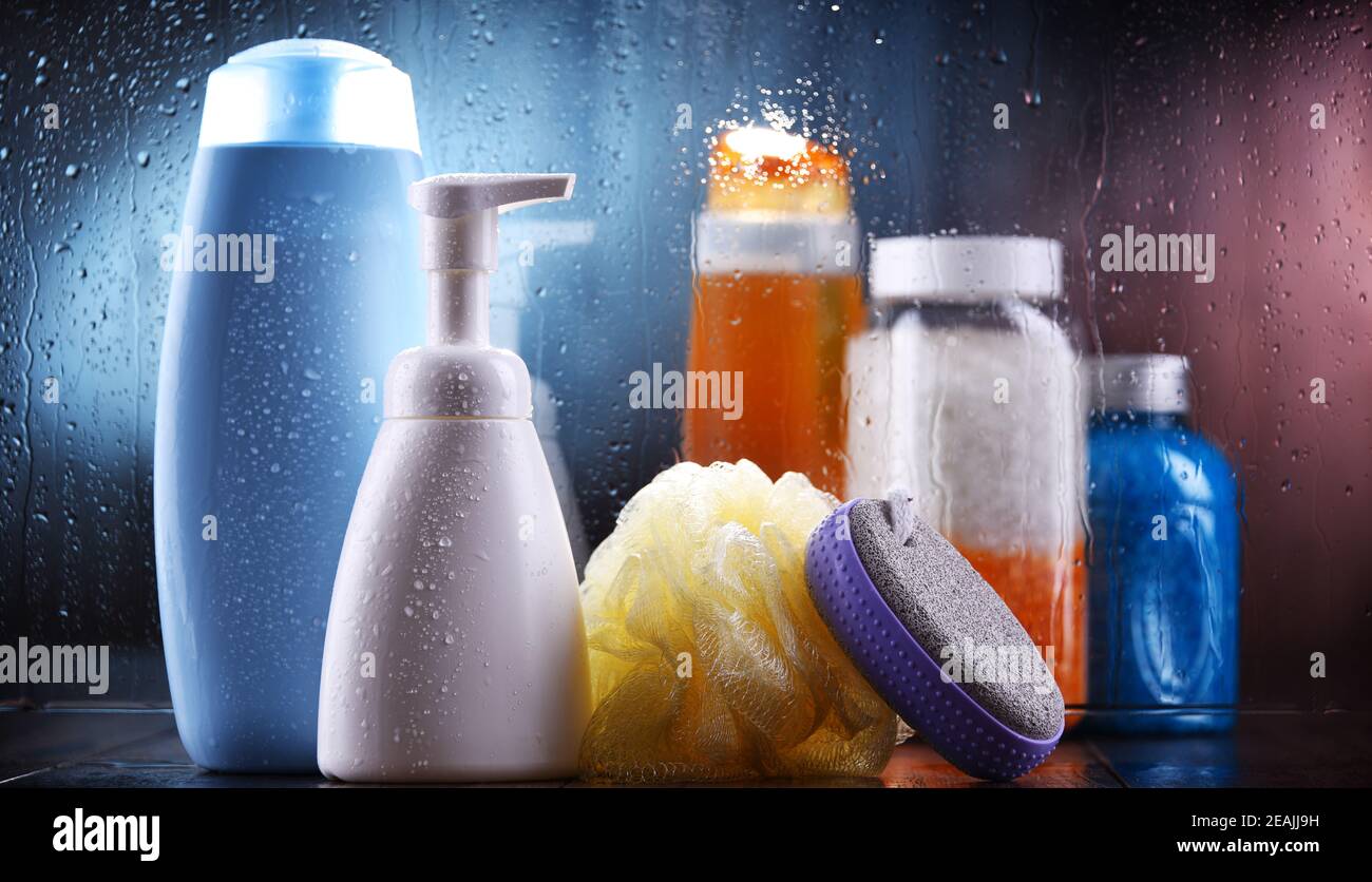 Different containers of body care products in the bathroom Stock Photo ...