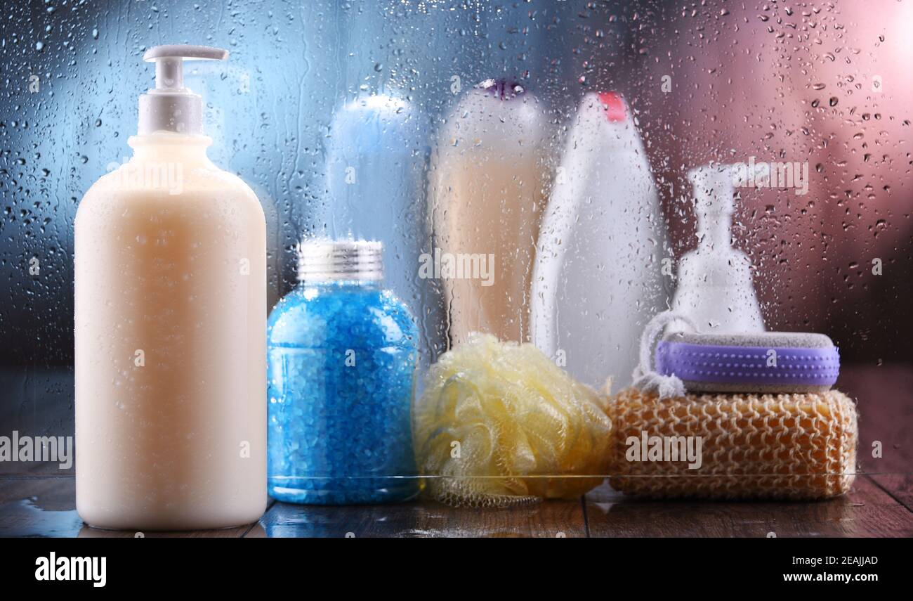 Different containers of body care products in the bathroom Stock Photo ...