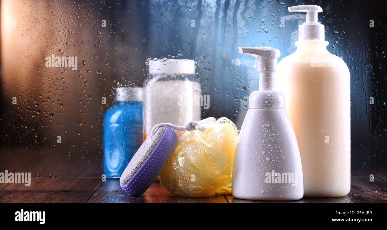 Different containers of body care products in the bathroom Stock Photo ...