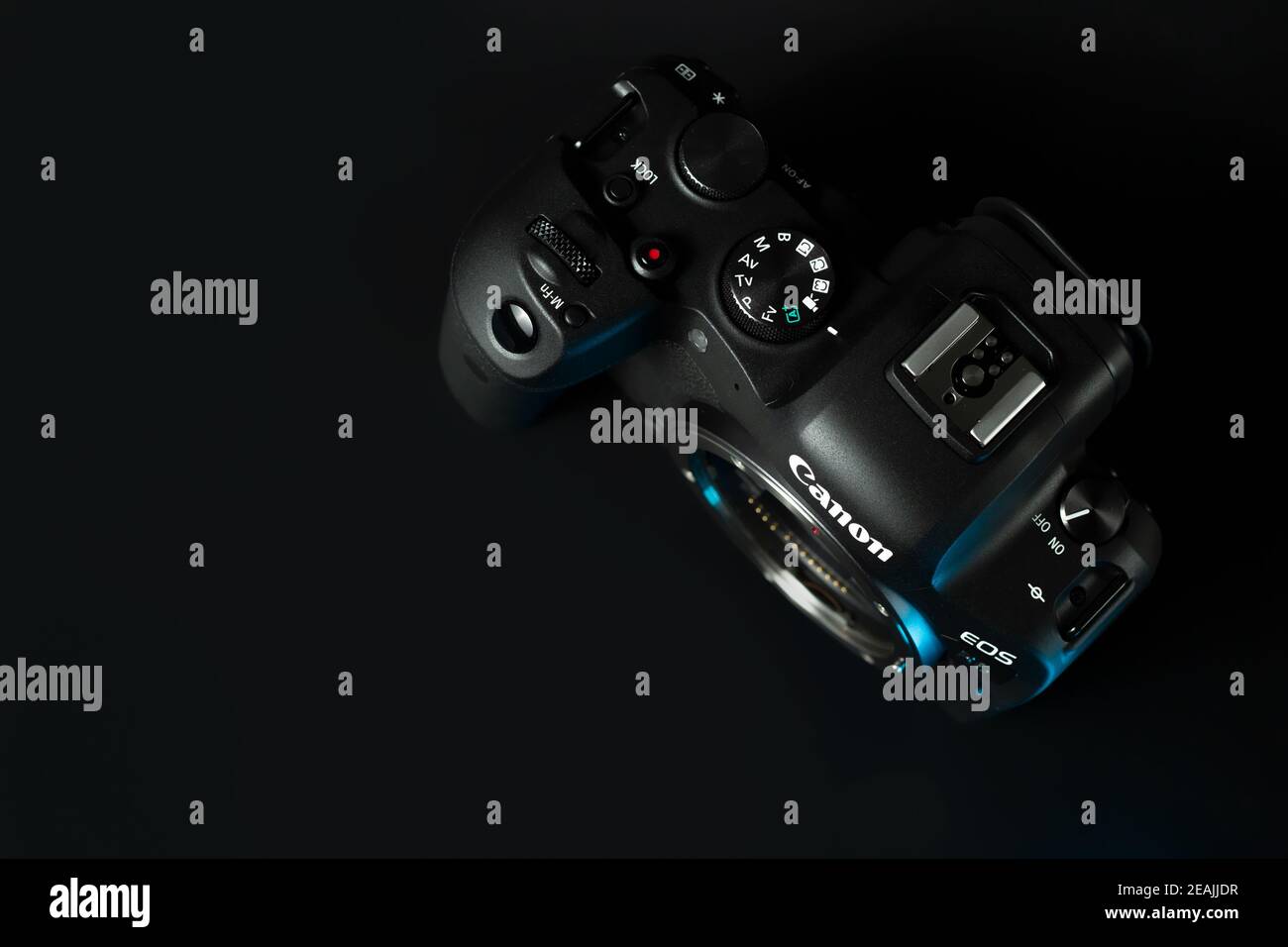 Canon r6 digital camera close-up, black background, glare Stock Photo ...