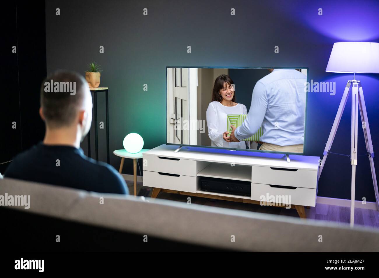 Man Streaming And Watching Movie Stock Photo - Alamy