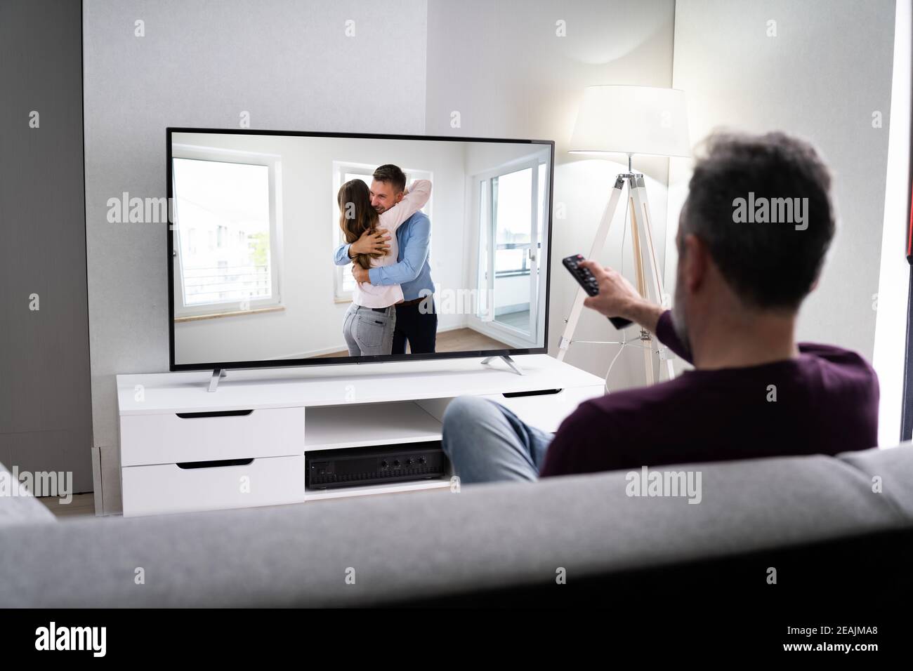 Elderly Man Streaming And Watching Movie Stock Photo - Alamy