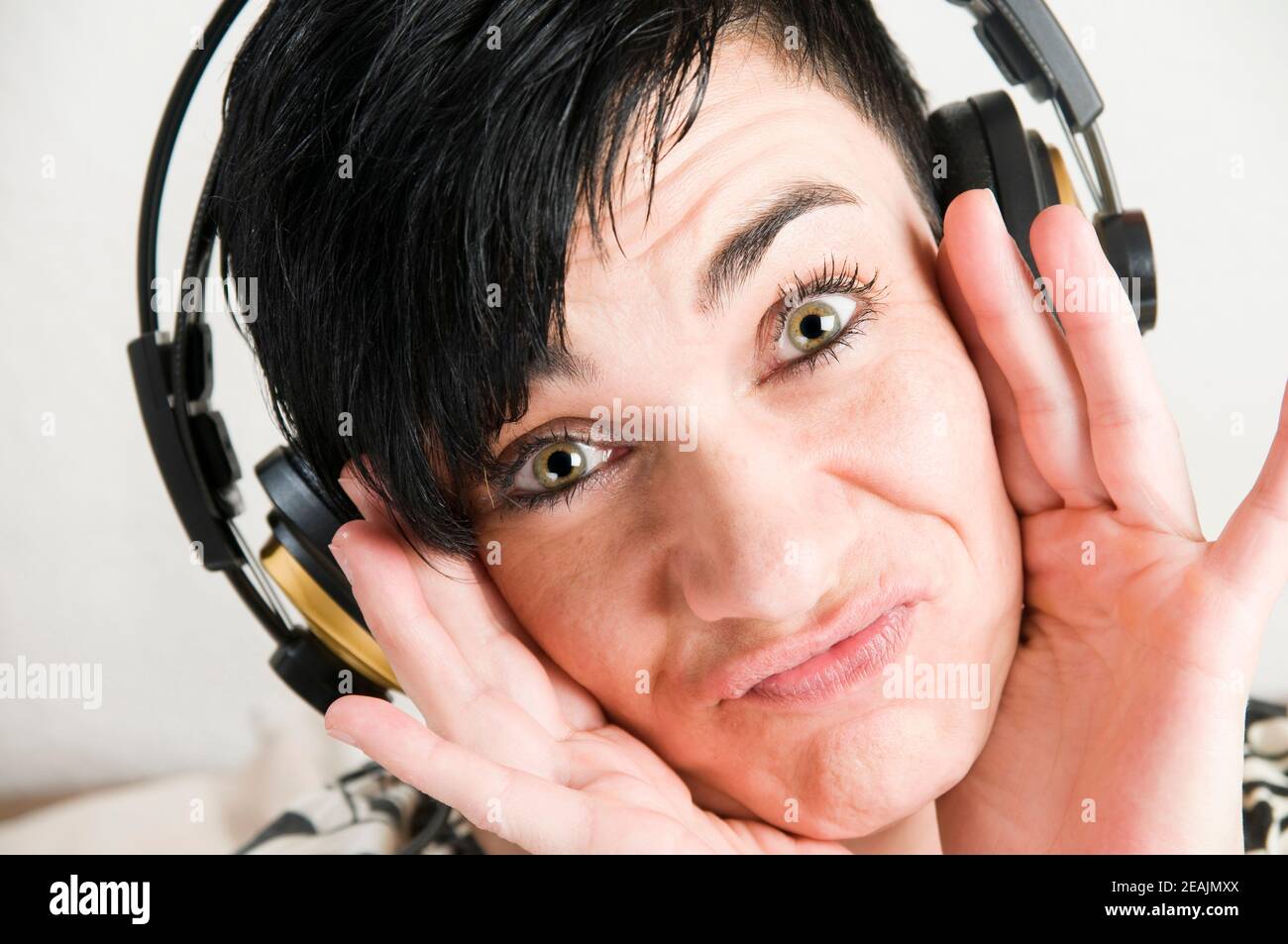 Woman pull a face Stock Photo - Alamy