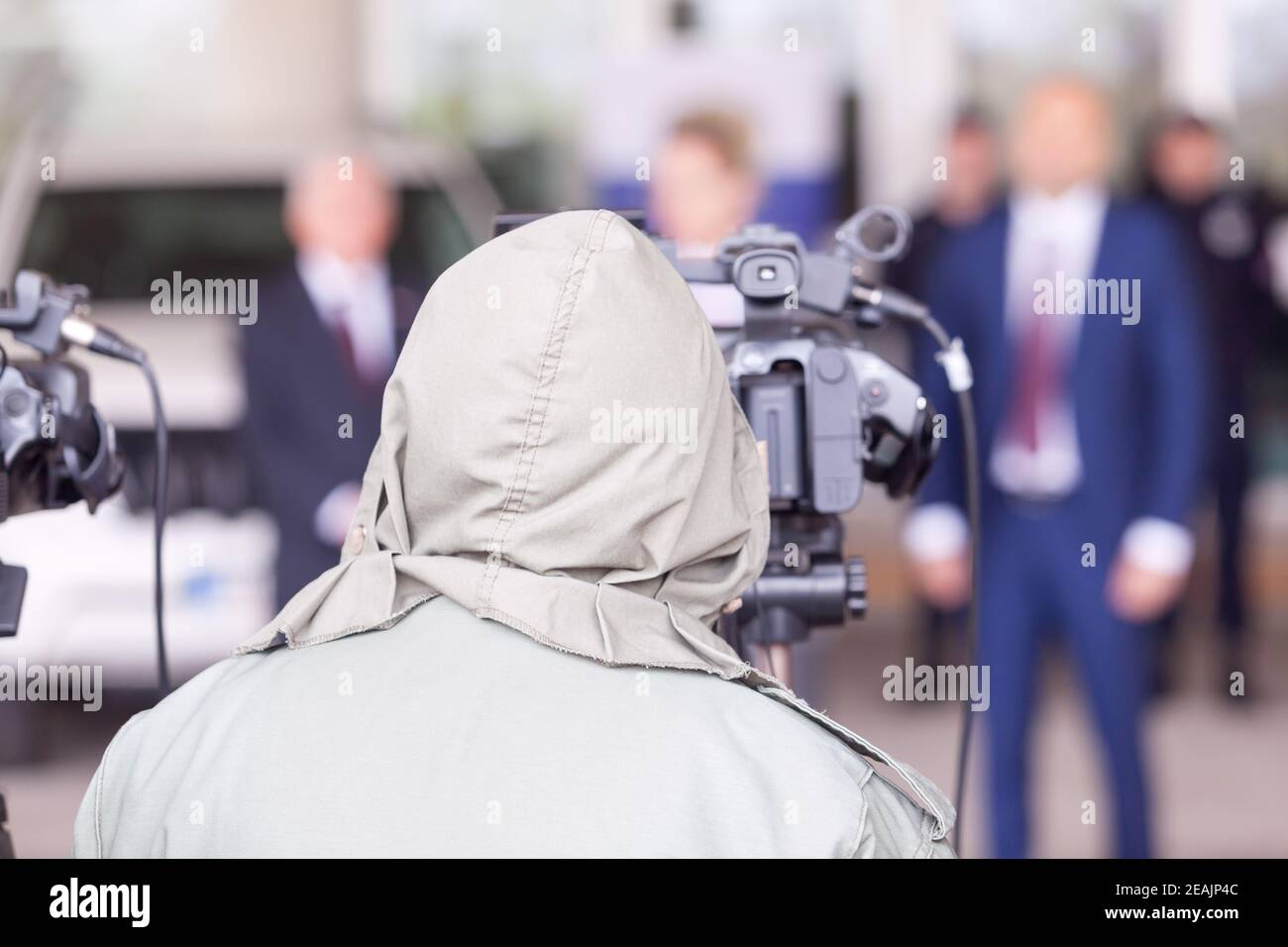 Camera operator working his equipment video hi-res stock photography ...