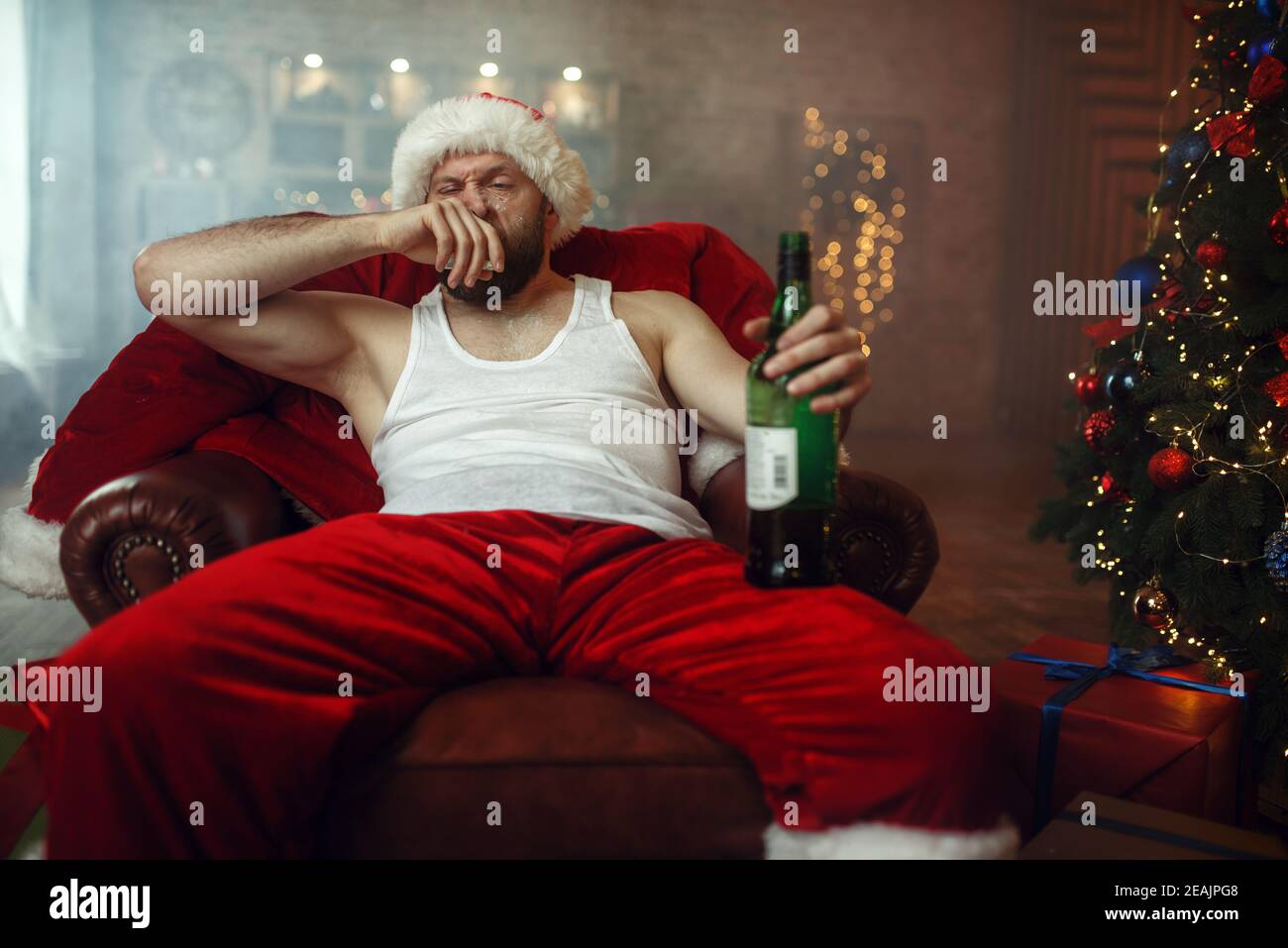 Bad Santa claus takes drugs with alcohol, humor Stock Photo - Alamy