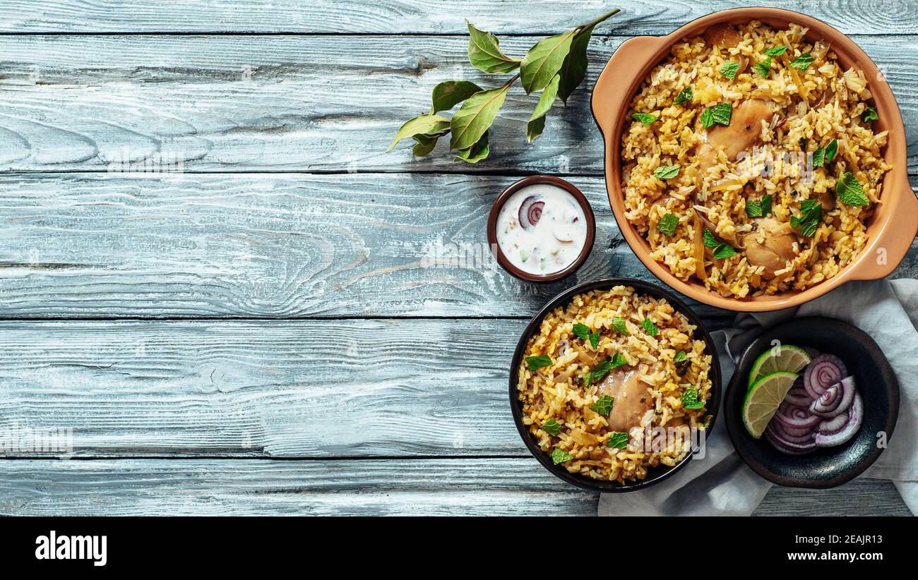 Pakistani chicken biryani rice, top view, copy space Stock Photo - Alamy