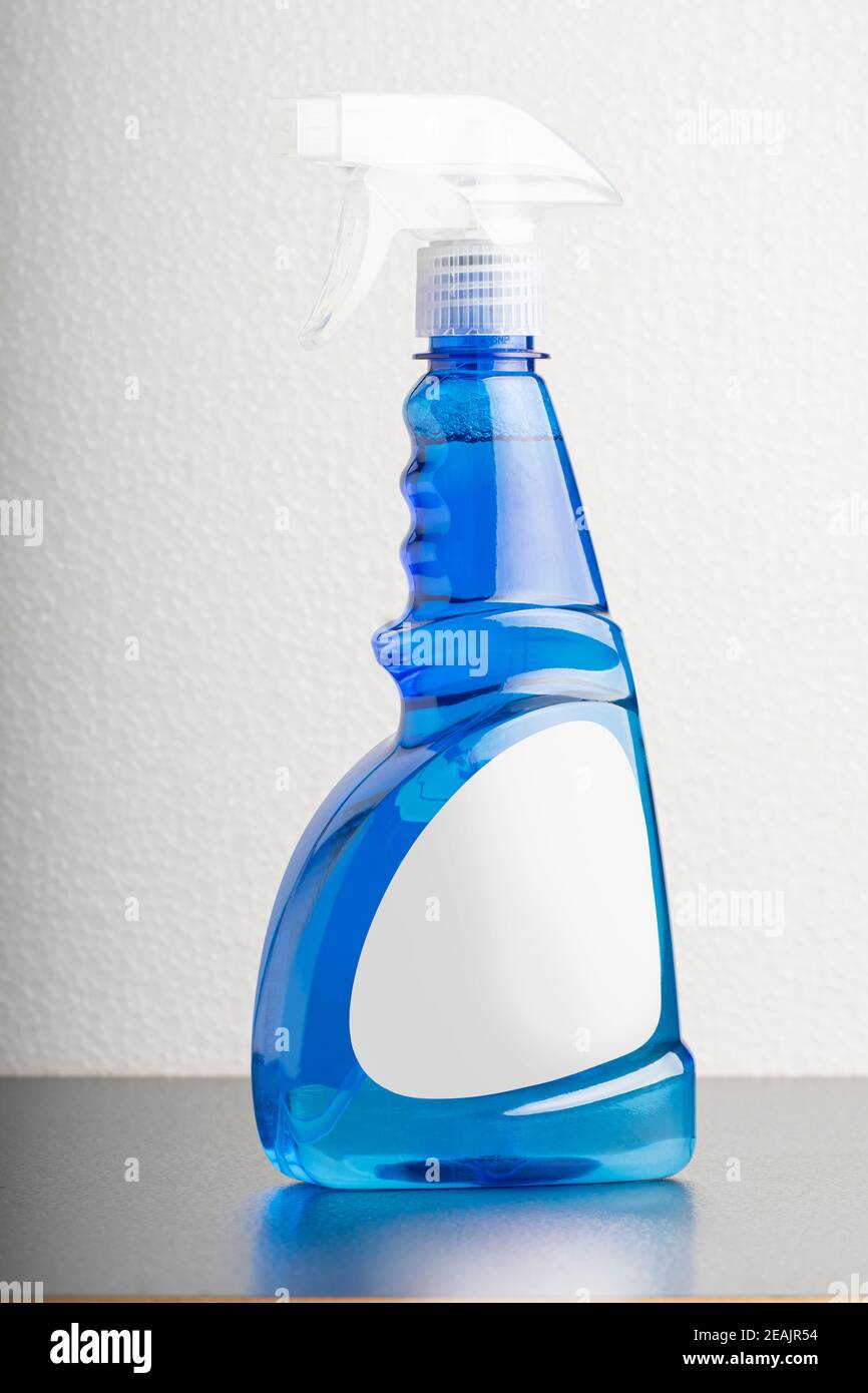 Cleaning liquid bottle in front of light gray background mock-up series ...