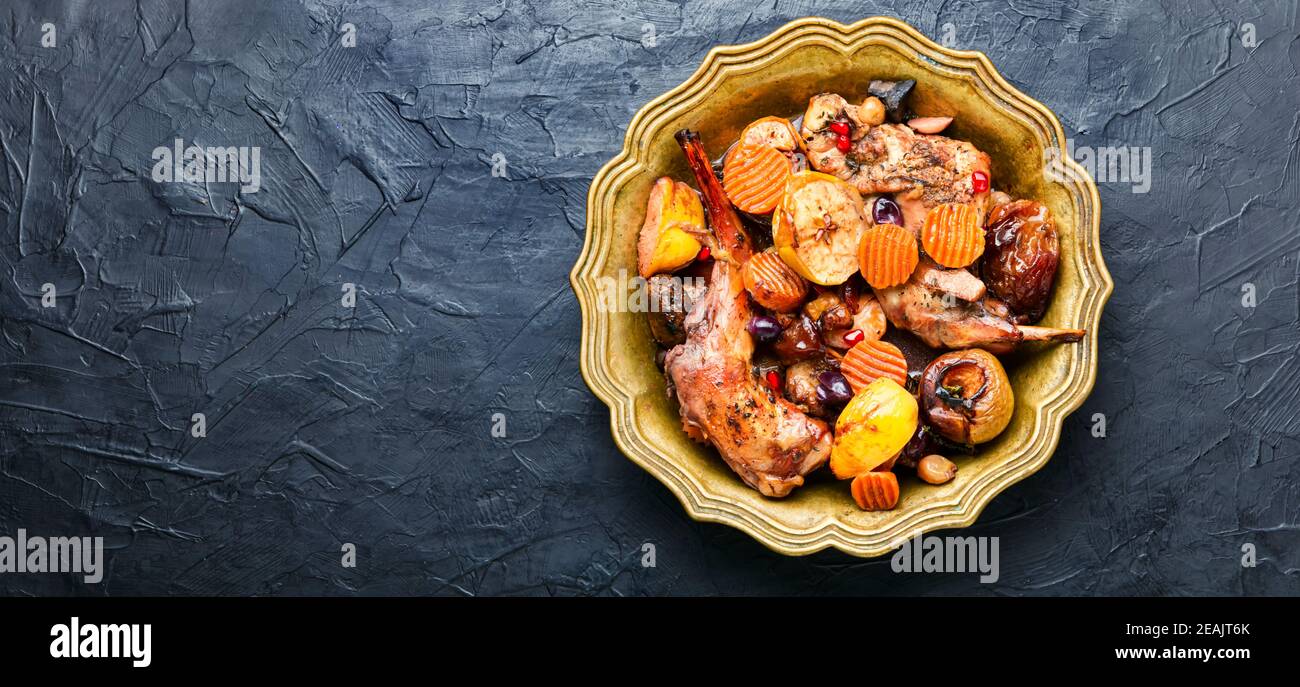 Roasted rabbit on a plate Stock Photo - Alamy