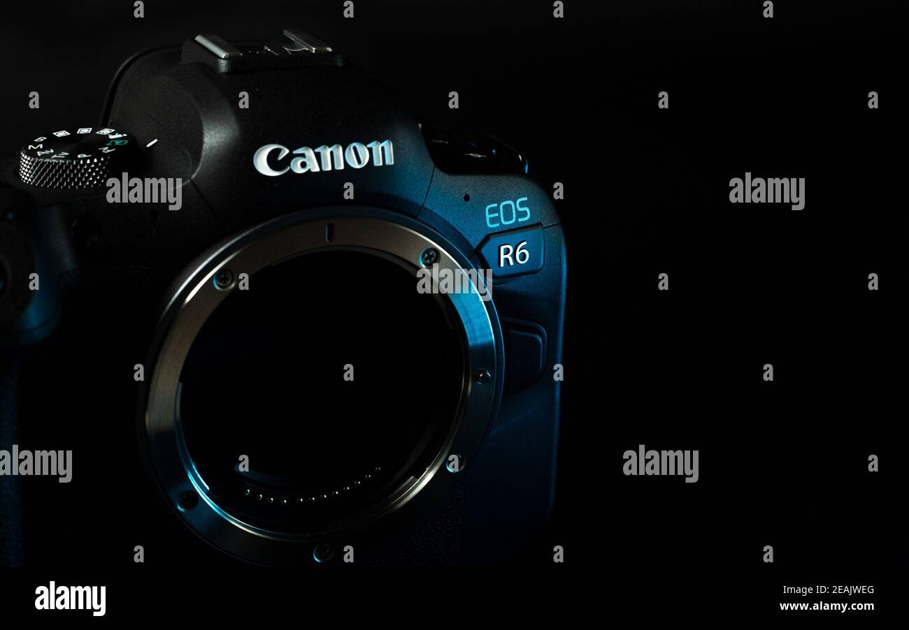 Canon r6 digital camera close-up, yellow background, glare Stock Photo ...