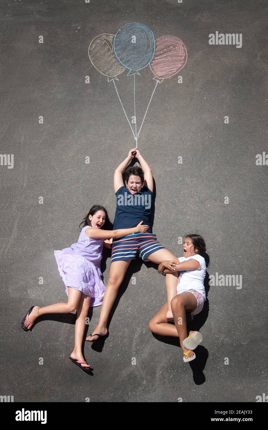 Kids and balloons Stock Photo - Alamy