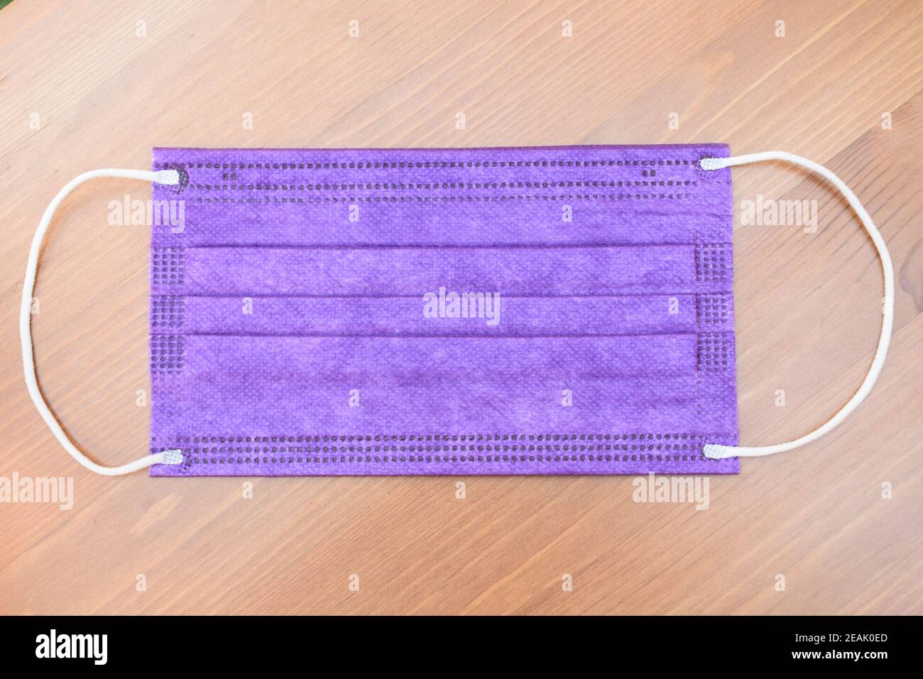 Purple Surgical Mask Stock Photo - Alamy