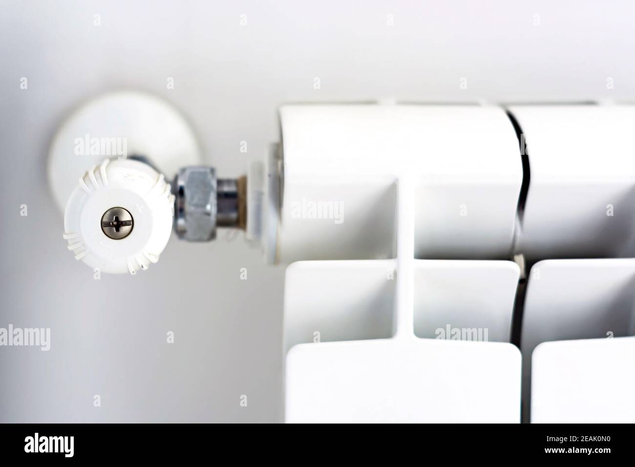 close-up view of the white knob that adjusts the temperature of the ...