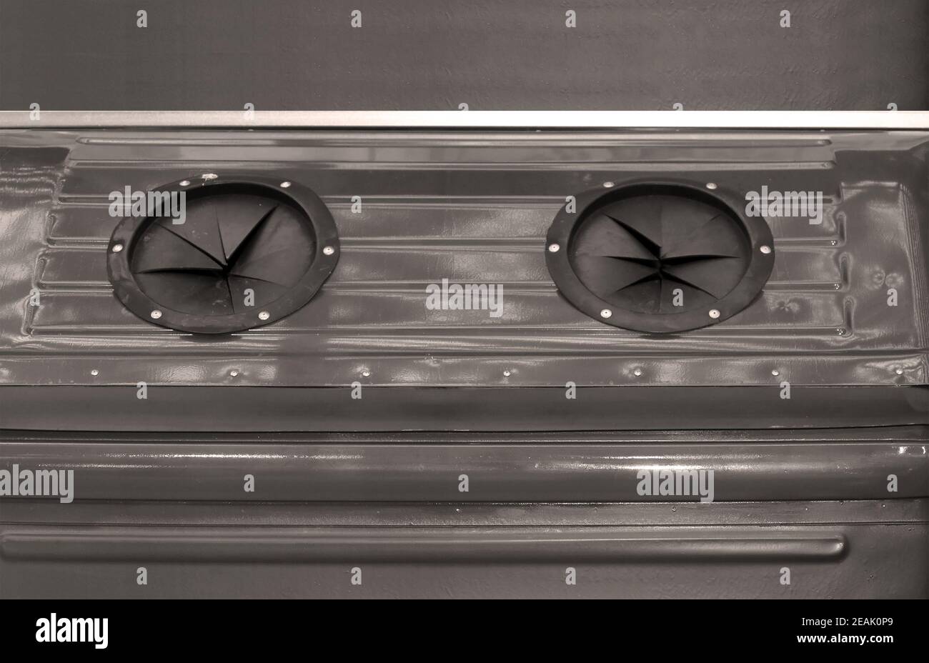 Glass recycle box holes Stock Photo - Alamy