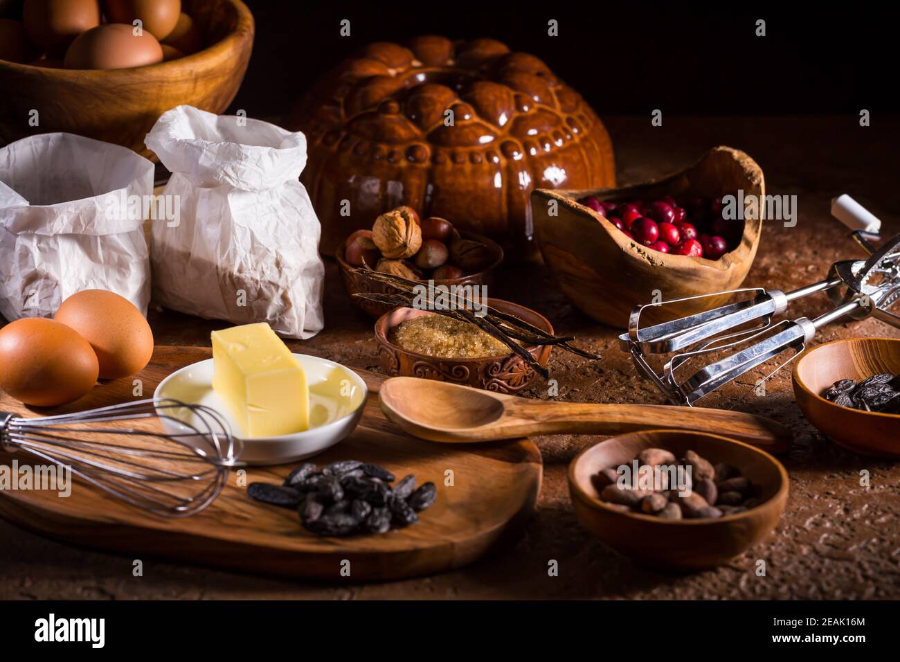 Different baking ingredients, spices and kitchen utensils in vintage ...