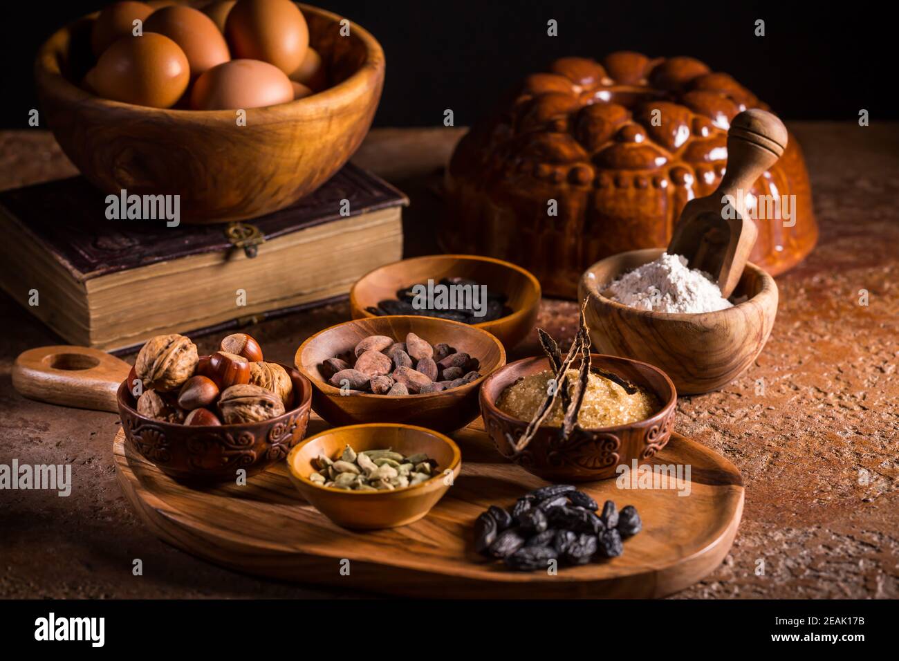 Different baking ingredients, spices and kitchen utensils in vintage ...