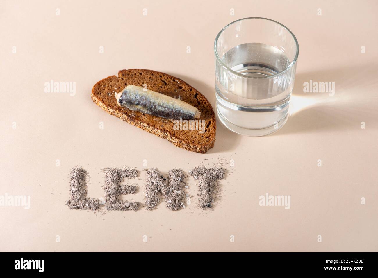 Lent Season, Holy Week and Good Friday concept - water, bread, fish and ...