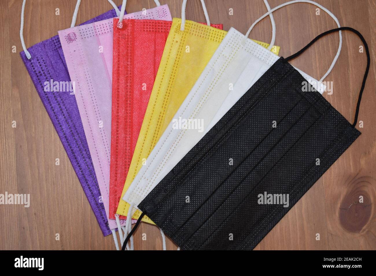 Six Surgical Masks in Various Colours Stock Photo - Alamy
