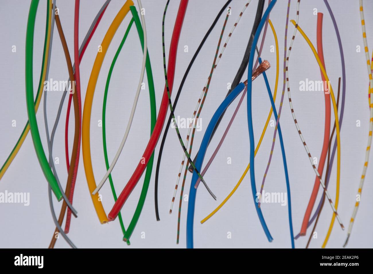 multicolor copper and aluminum power cables on the white background ...