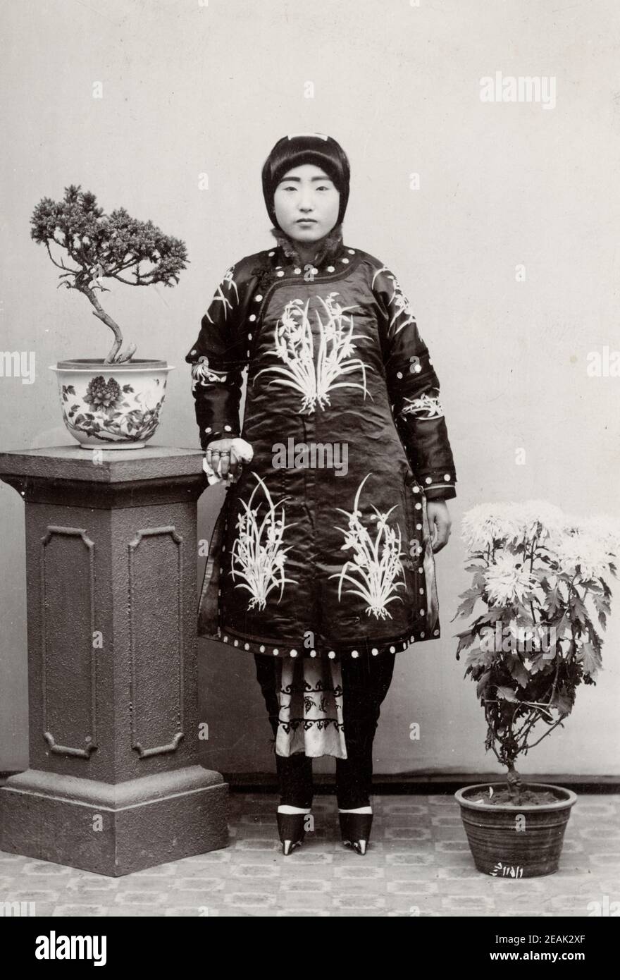 Early 20th century photograph: Young Chunese woman, ornate robe, bound ...