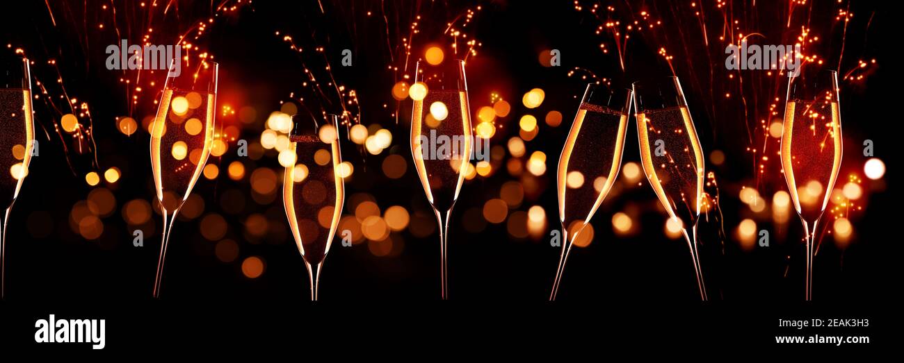 Celebrations with champagne and fireworks Stock Photo - Alamy