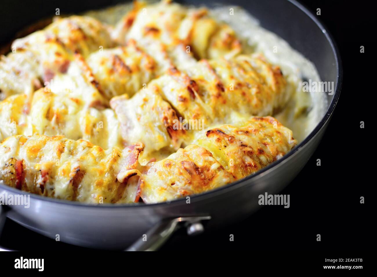 Croque Monsieur Hasselback Potatoes Stock Photo - Alamy