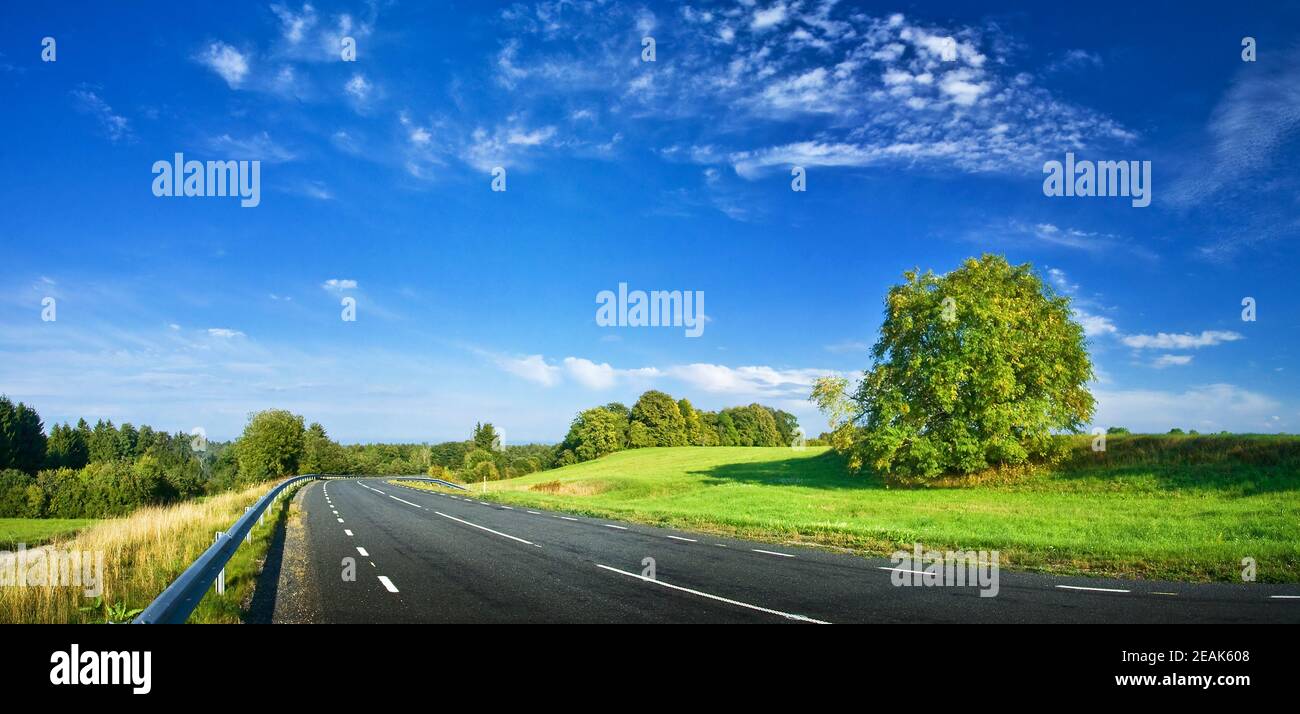 Road panorama on summer evening Stock Photo - Alamy