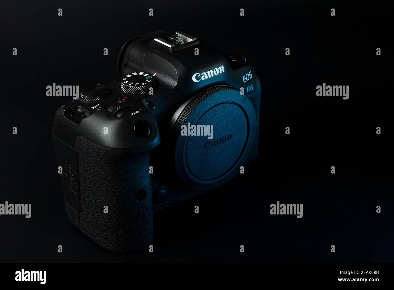 Canon r6 digital camera close-up, black background, glare Stock Photo ...