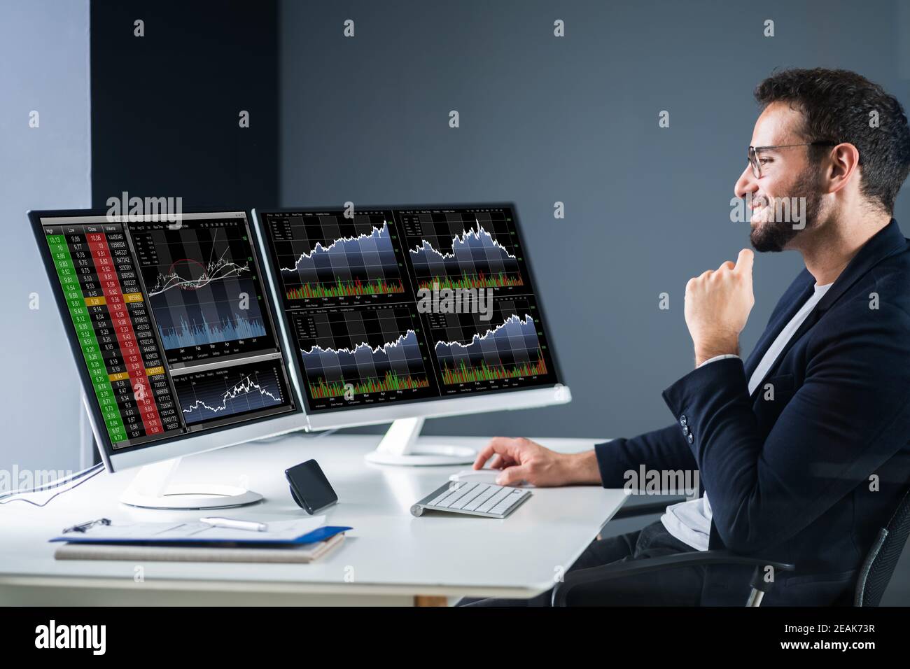 Stock Exchange Business Analyst Using Computer Stock Photo - Alamy