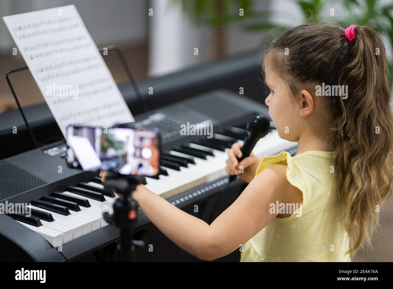 Child Girl Playing Music Keyboard Piano Stock Photo - Alamy
