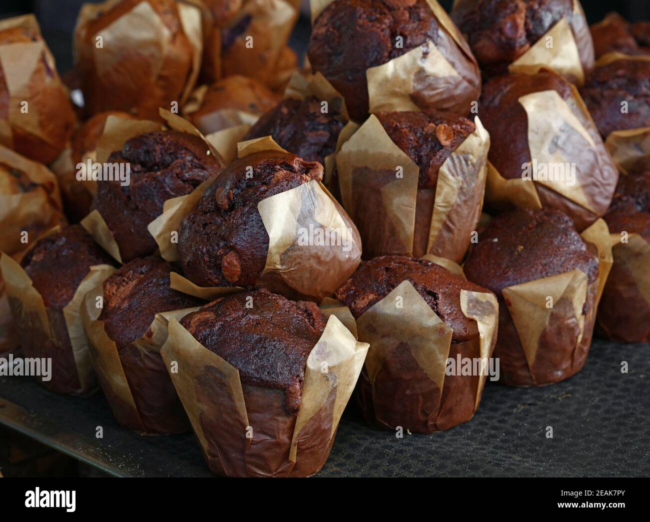 Chocolate cupcakes or muffins on retail display Stock Photo - Alamy